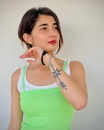 Nisha Bhatt Wiki, Age, Family, Boyfriend, Photos, Songs & More